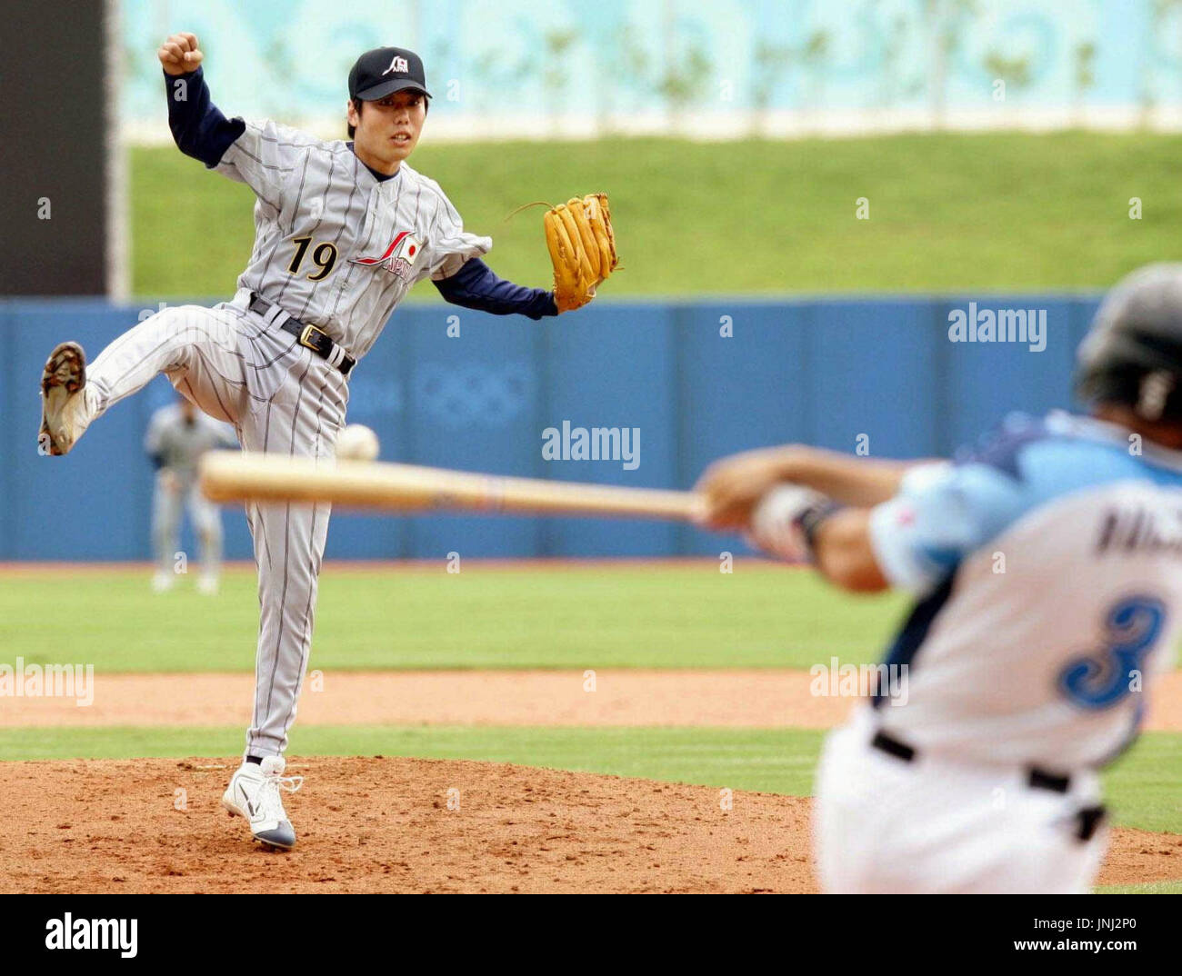 ATHENS, Greece - Japan's Koki Uehara delivers in an Olympic baseball ...