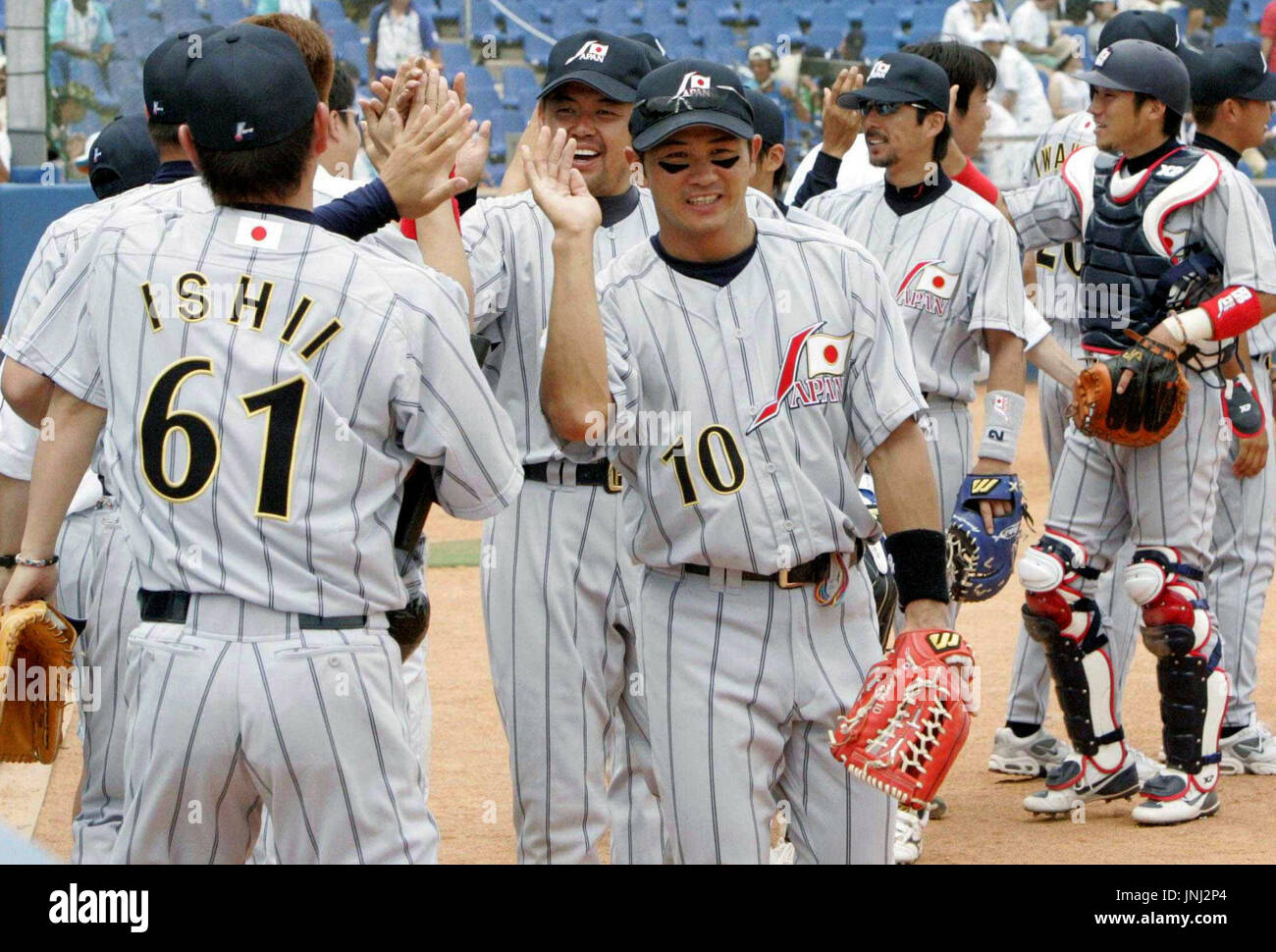 ATHENS, Greece - Japanese baseball team members celebrate after beating ...