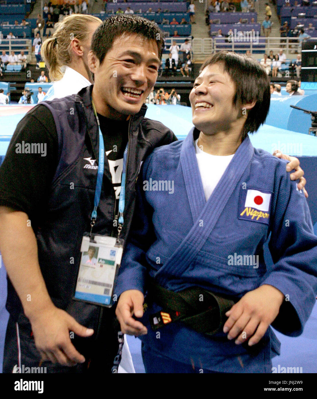 ATHENS, Greece - Ayumi Tanimoto of Japan (R) and her coach Toshihiko ...