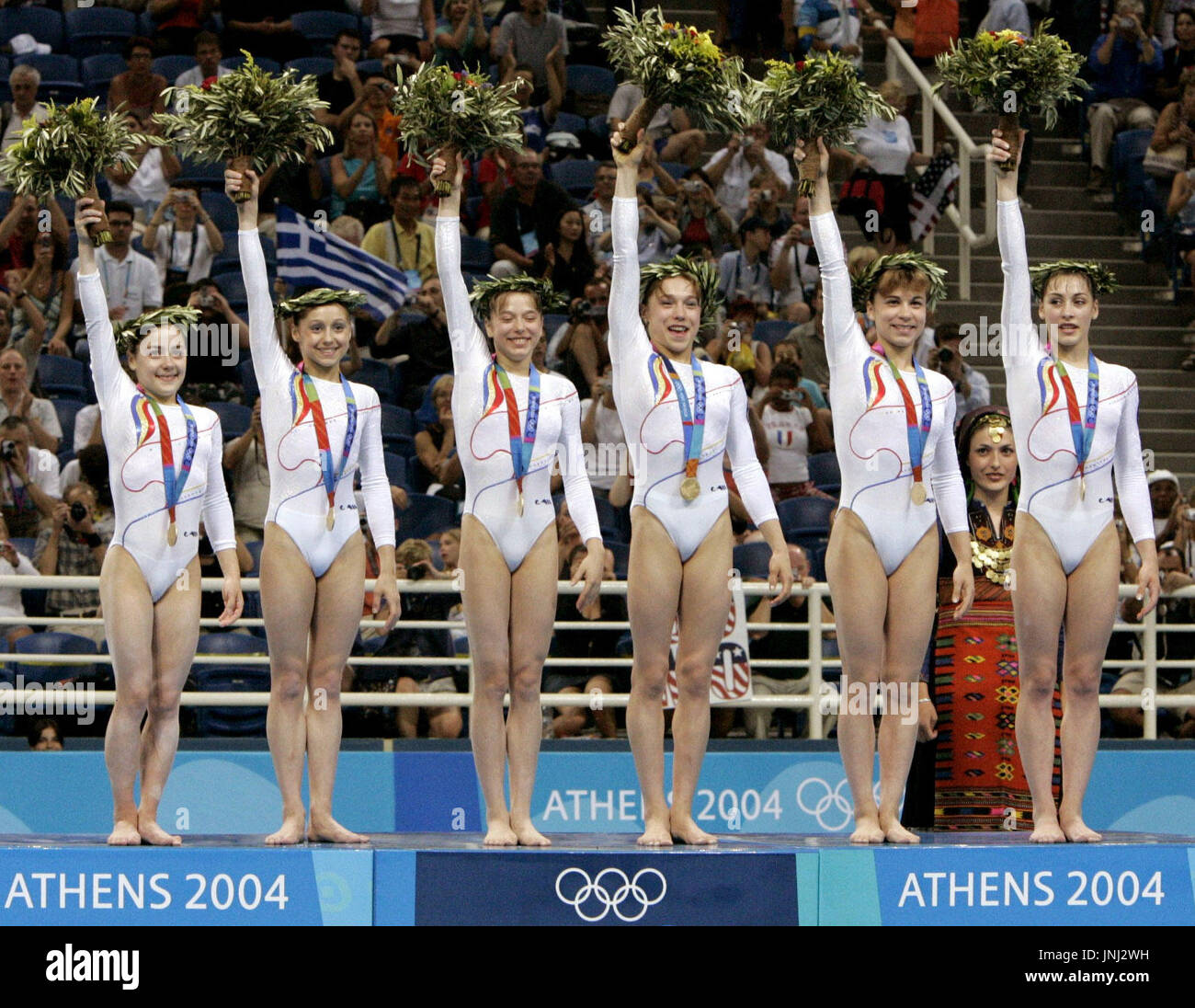 ATHENS, Greece - Romanian gymnasts (from L to R) Oana Ban, Daniela Sofronie, Alexandra Georgiana ...