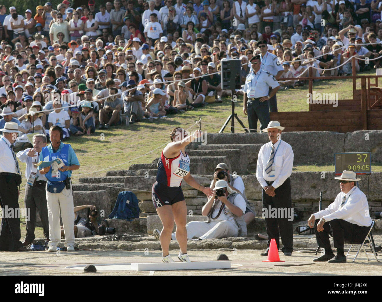 OLYMPIA, Greece - Japan's shot put athlete Chinatsu Mori (C) performs ...