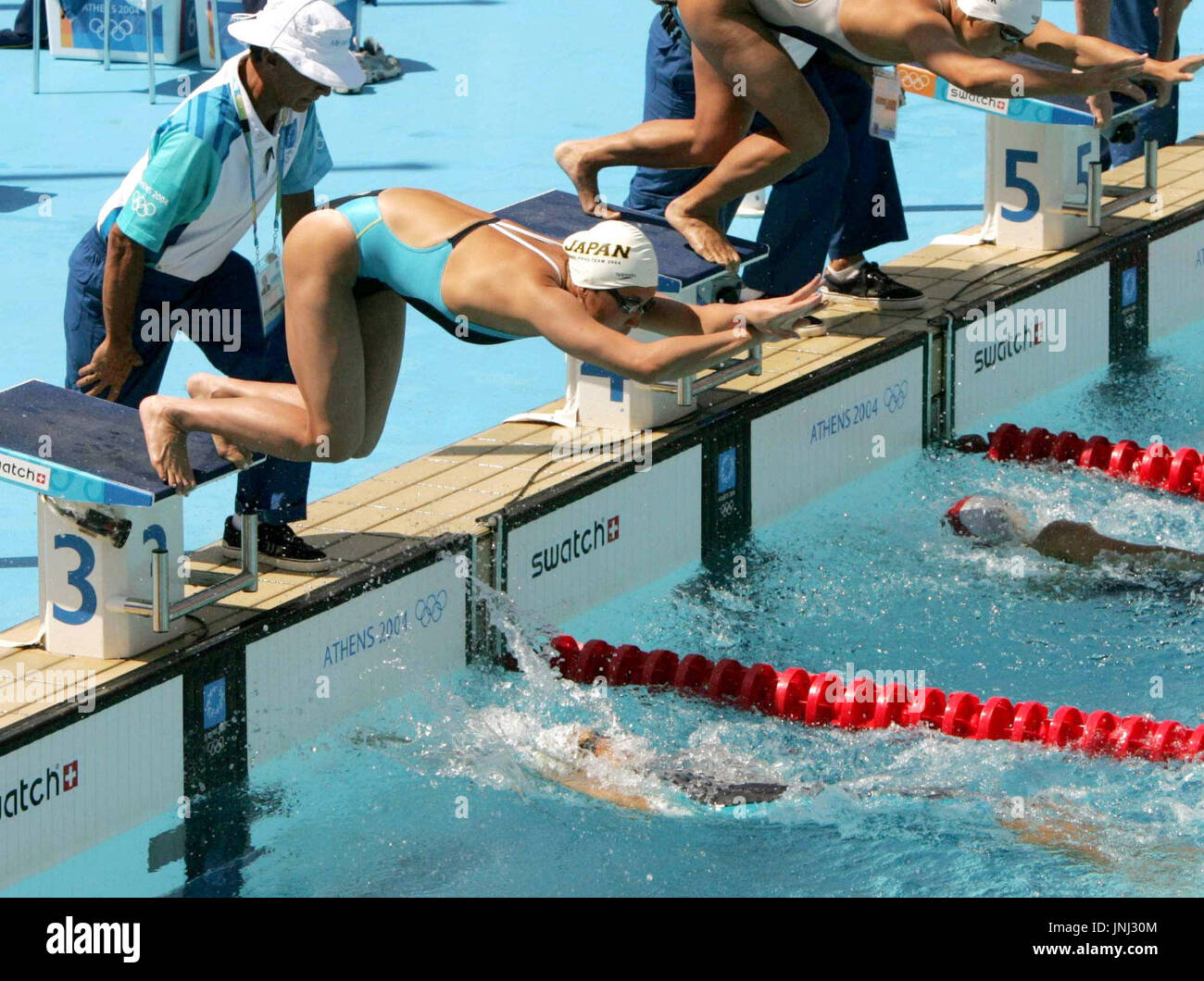 ATHENS, Greece - Noriko Inada relays to second swimmer Masami Tanaka in ...