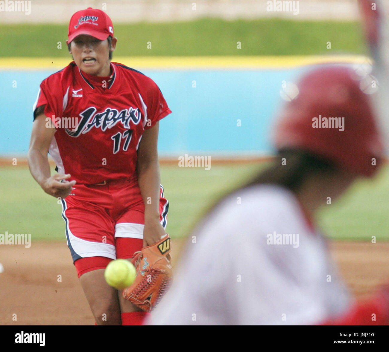 ATHENS, Greece - Yukiko Ueno of Japan (L) becomes the first pitcher in ...