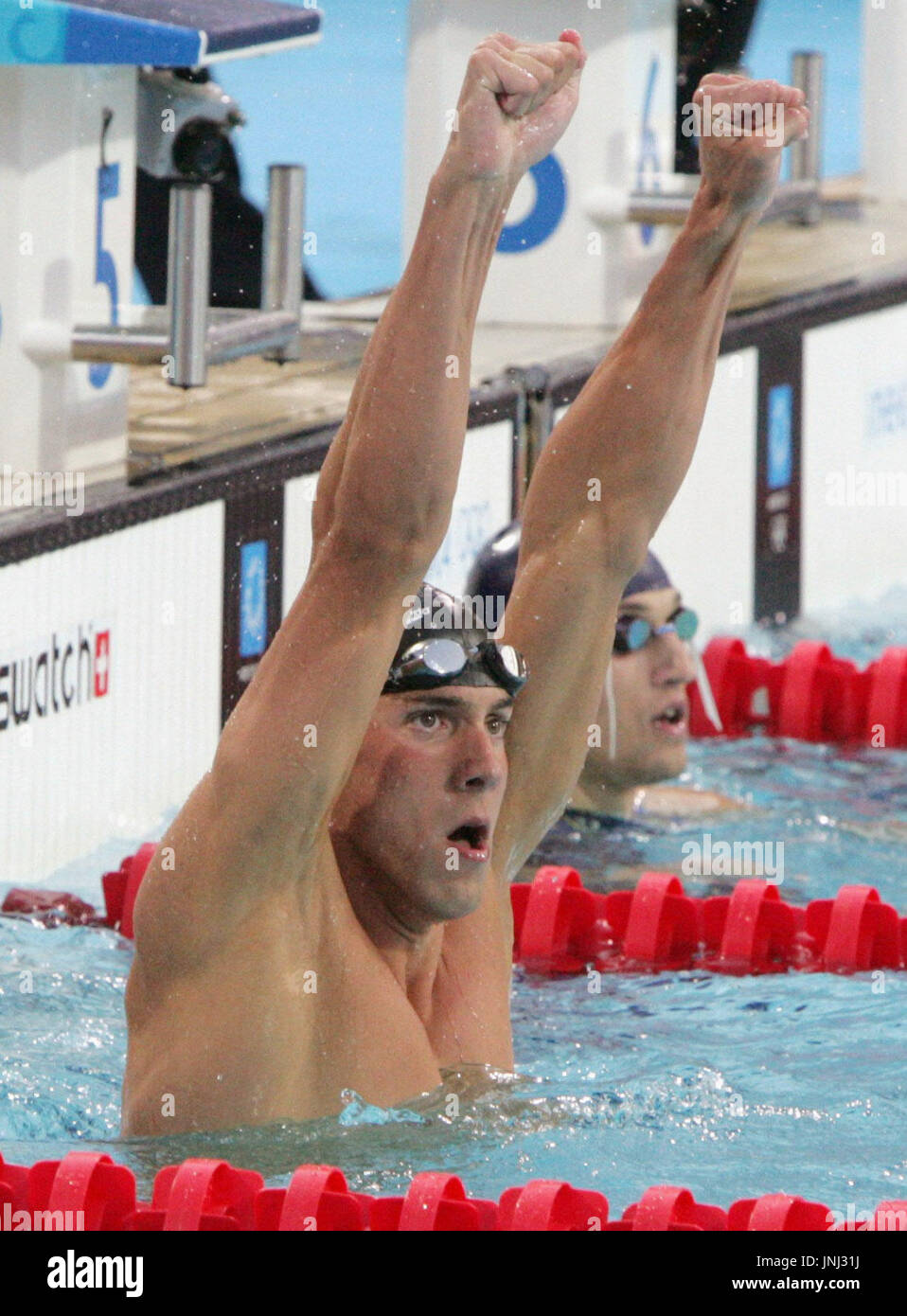 ATHENS, Greece - Michael Phelps of the United States celebrates winning ...