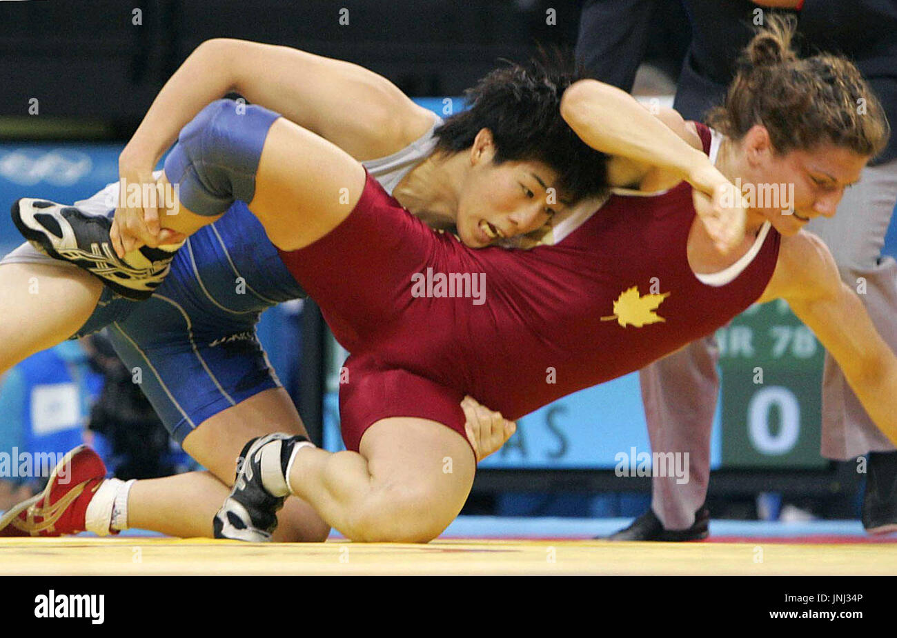 ATHENS, Greece - Japan's Saori Yoshida (L) and Tonya Verbeek of Canada ...