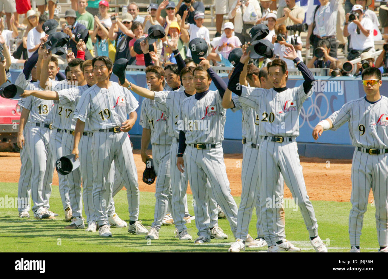 ATHENS, Greece - Japan's baseball players wave to spectators at the ...