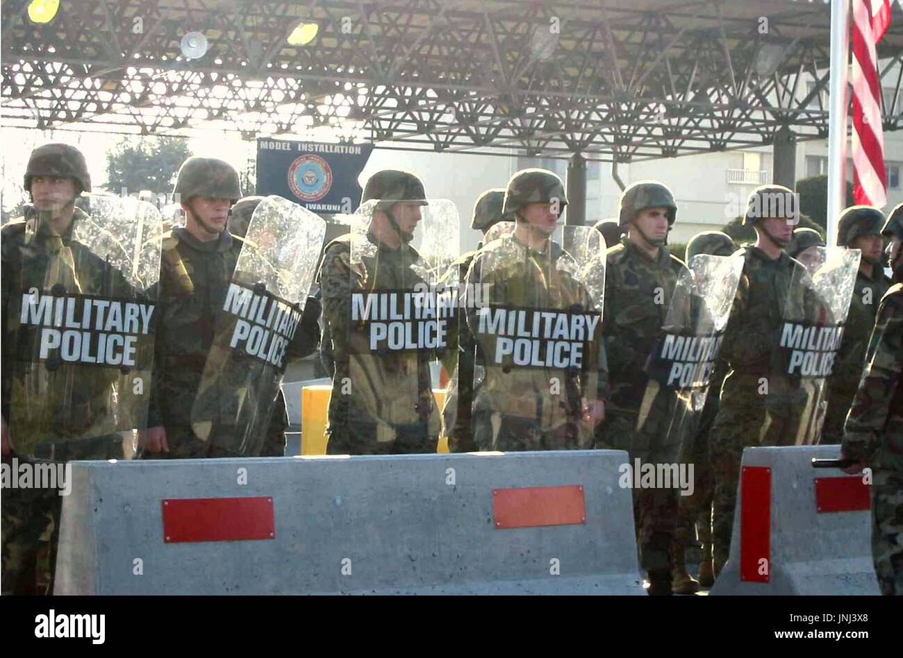 IWAKUNI, Japan - U.S. military police block the entrance to the U.S ...