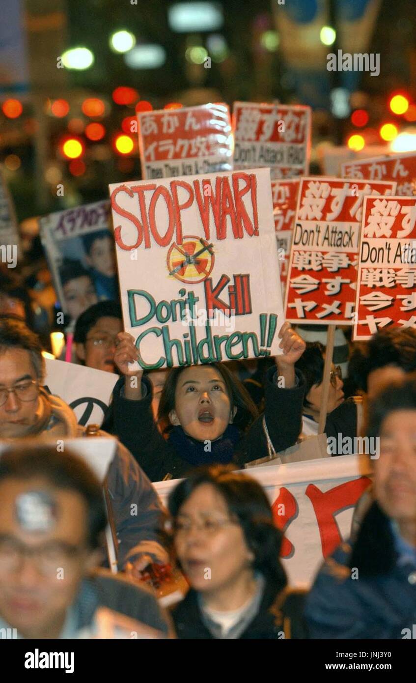 OSAKA, Japan - People parade in downtown Osaka on March 20 to protest ...