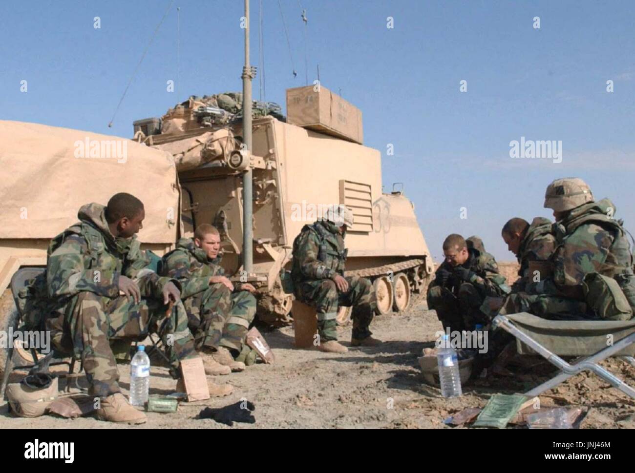 SOUTHERN IRAQ - U.S. soldiers take a rest on the outskirts of Samawah ...