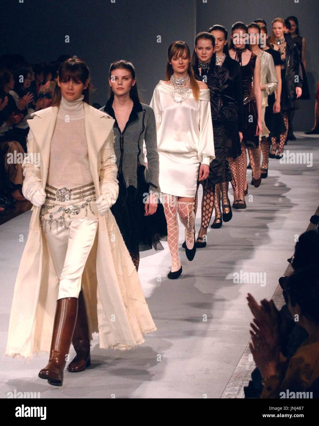 TOKYO, Japan - Models line up on the stage in the ''2003-04 Autumn ...