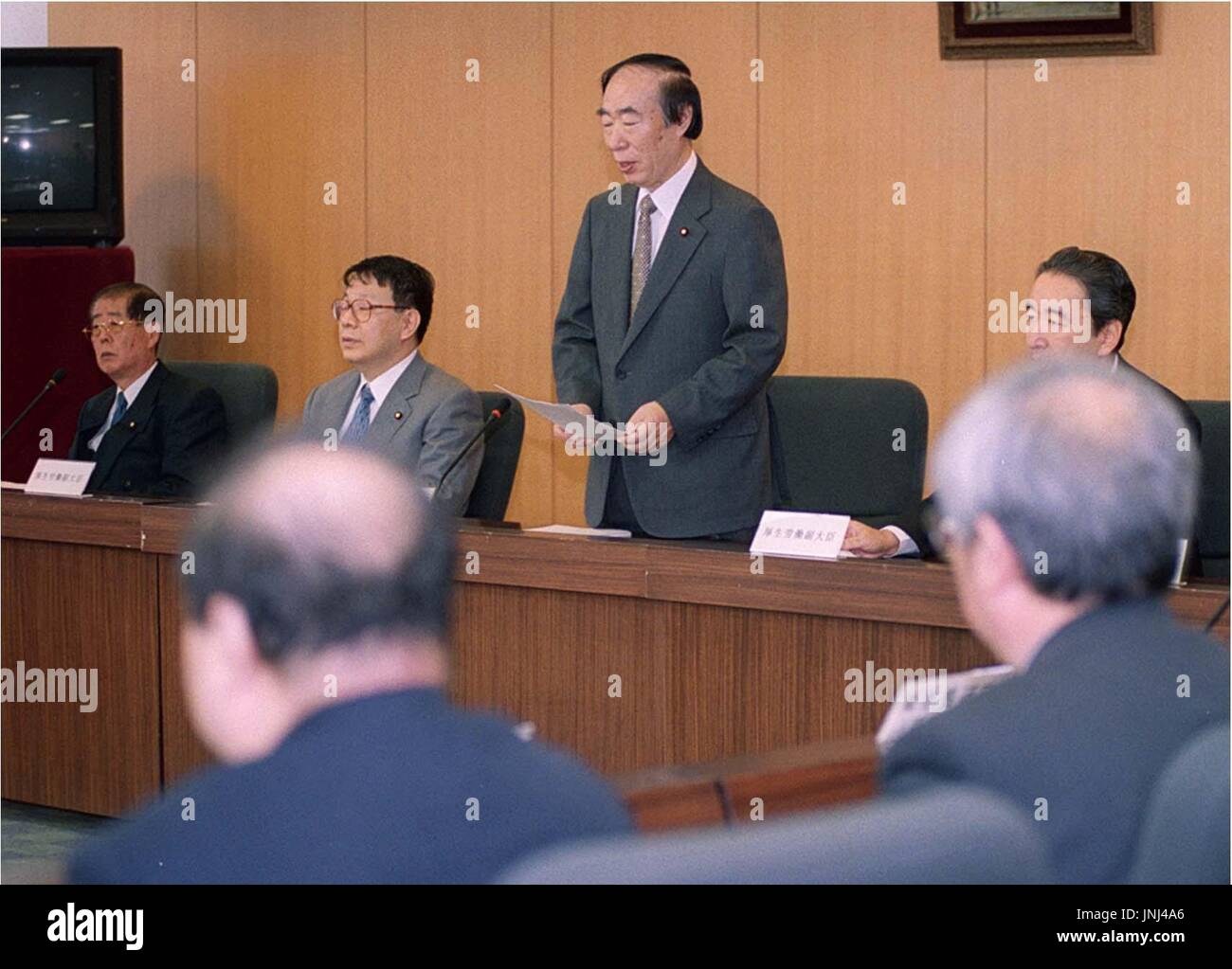 TOKYO, Japan - Japan's health minister, Chikara Sakaguchi, (standing ...