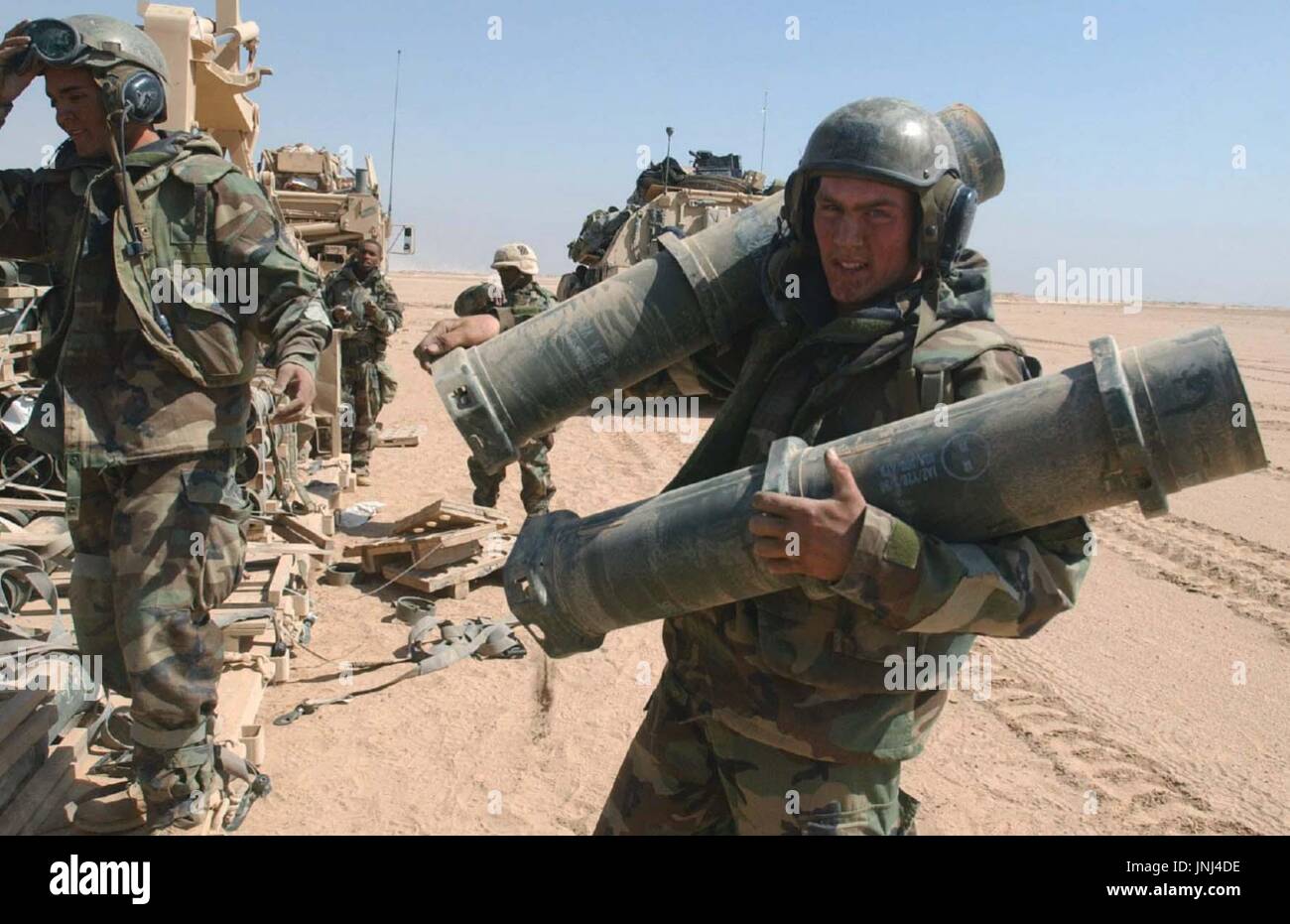 KARBALA, Iraq - A U.S. 3rd Infantry Division soldier gets things ready ...