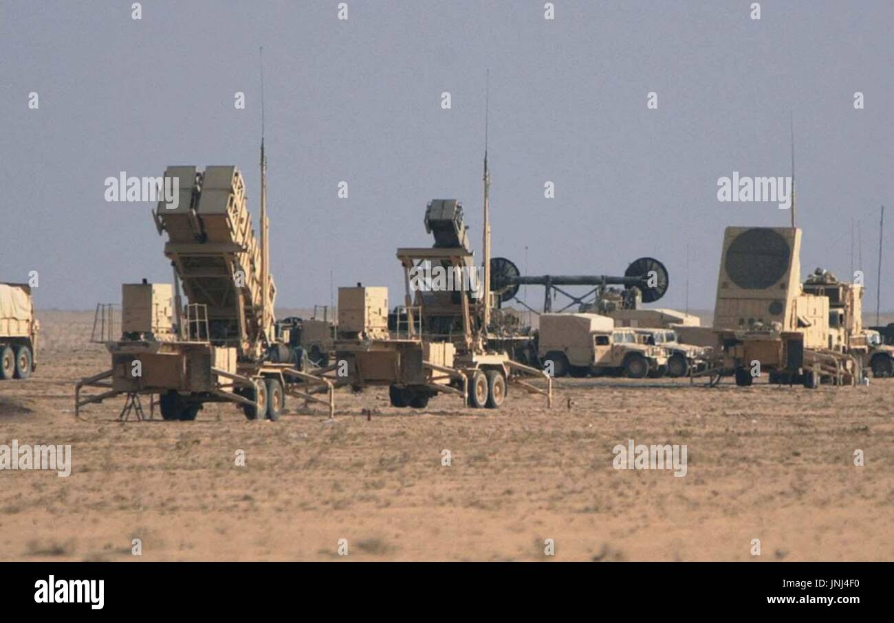 NEAR KARBALA, Iraq - Patriot missile launchers are seen targeted on ...