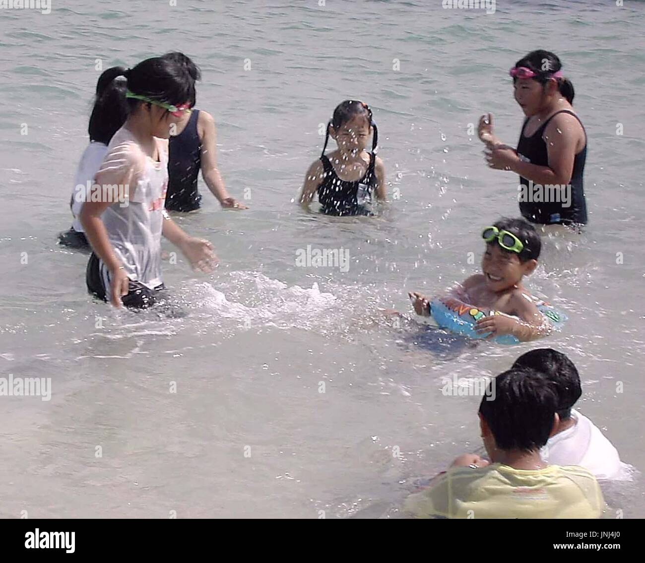 NAHA, Japan - Children in Naha, Okinawa Prefecture, swim at a Naha ...