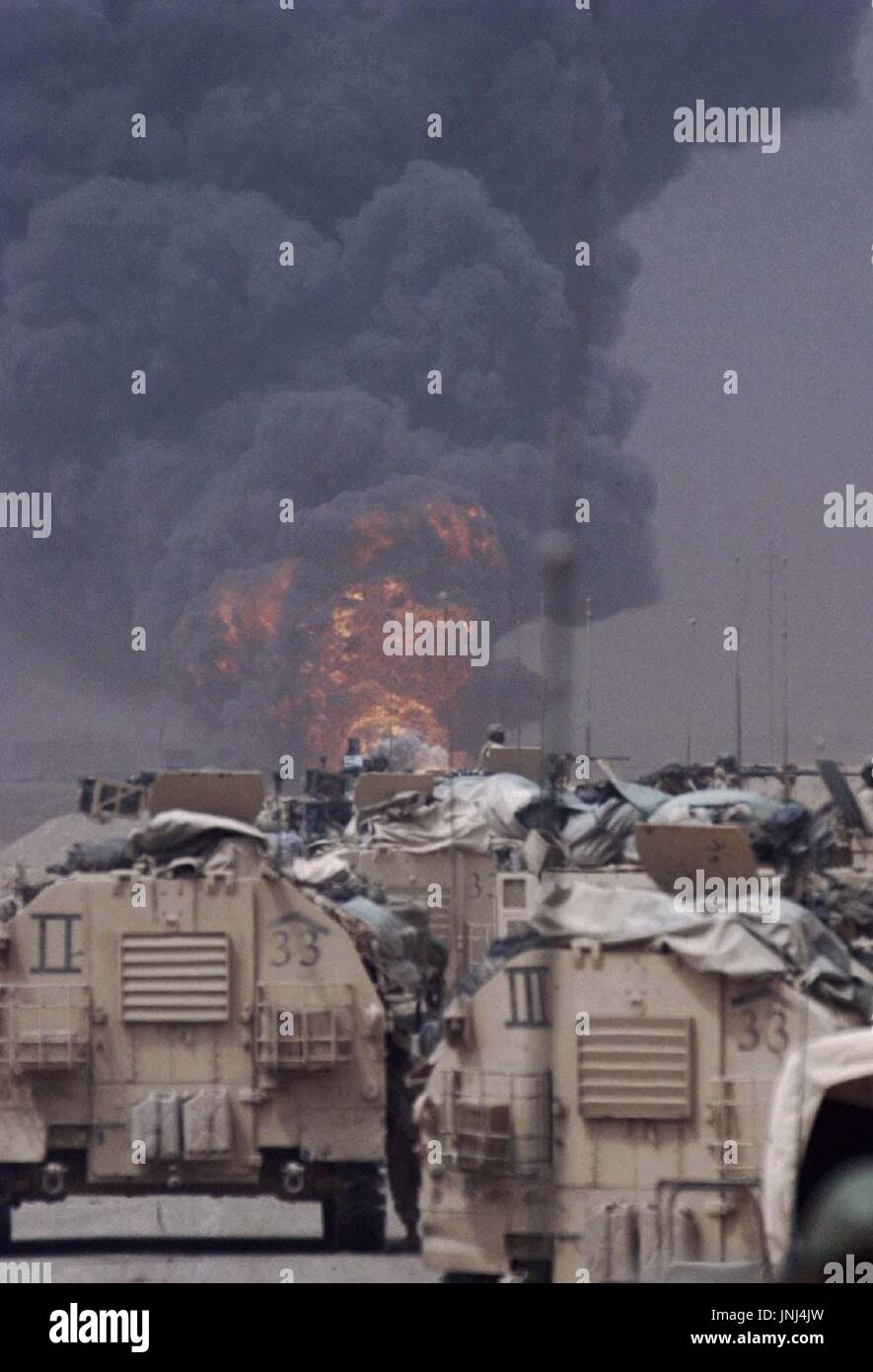 BAGHDAD, Iraq - Black smoke from a burning Iraqi tank lorry rise into ...