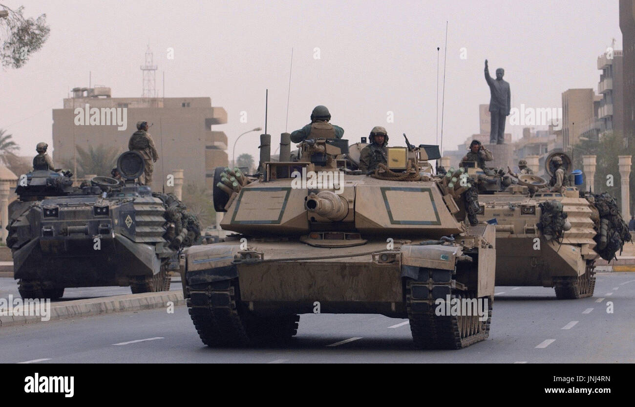 BAGHDAD, Iraq - U.S. banks on guard in front of the Saddam Hussein ...