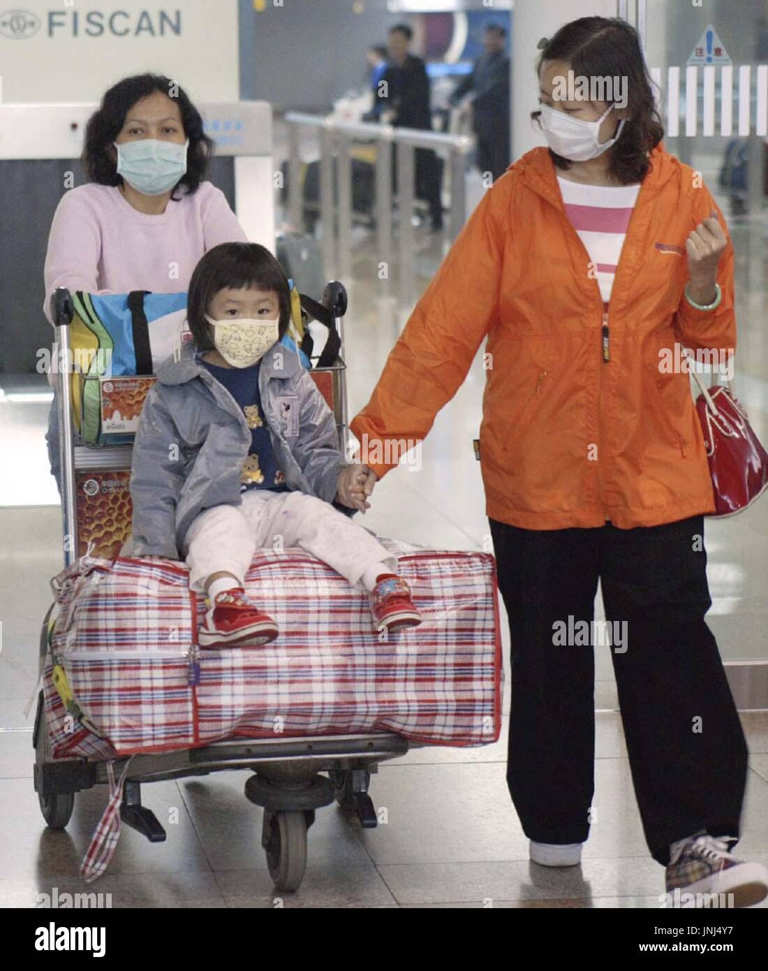 BEIJING, China - Passengers arrive at Beijing international airport on ...