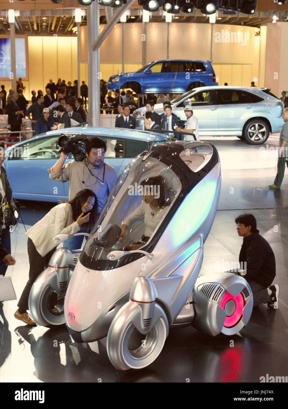 CHIBA, Japan - Toyota Motor Corp. exhibits a single-seat electric ...