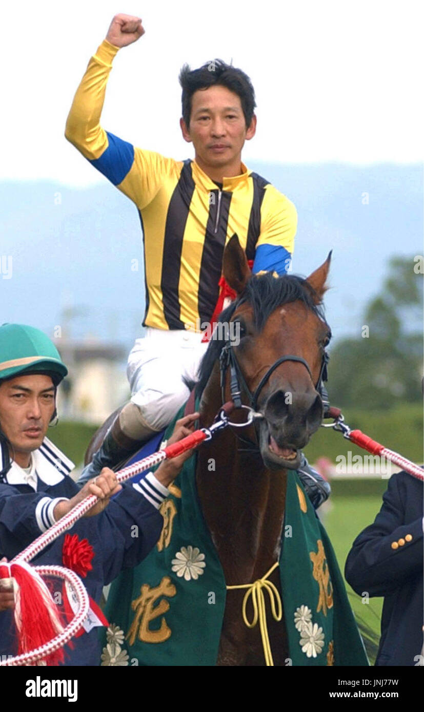 KYOTO, Japan - Jockey Katsumi Ando celebrates his victory on fifth ...