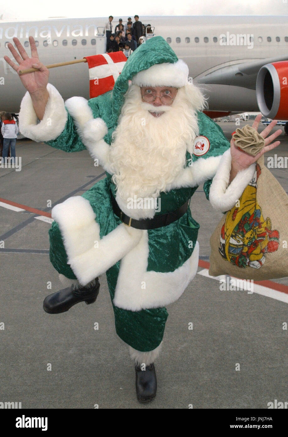 NARITA, Japan - A green-suited Santa Claus arrives in Narita from ...