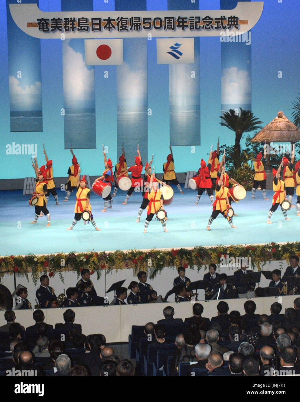 NAZE, Japan - About 1,000 people attending the ceremony to mark the ...