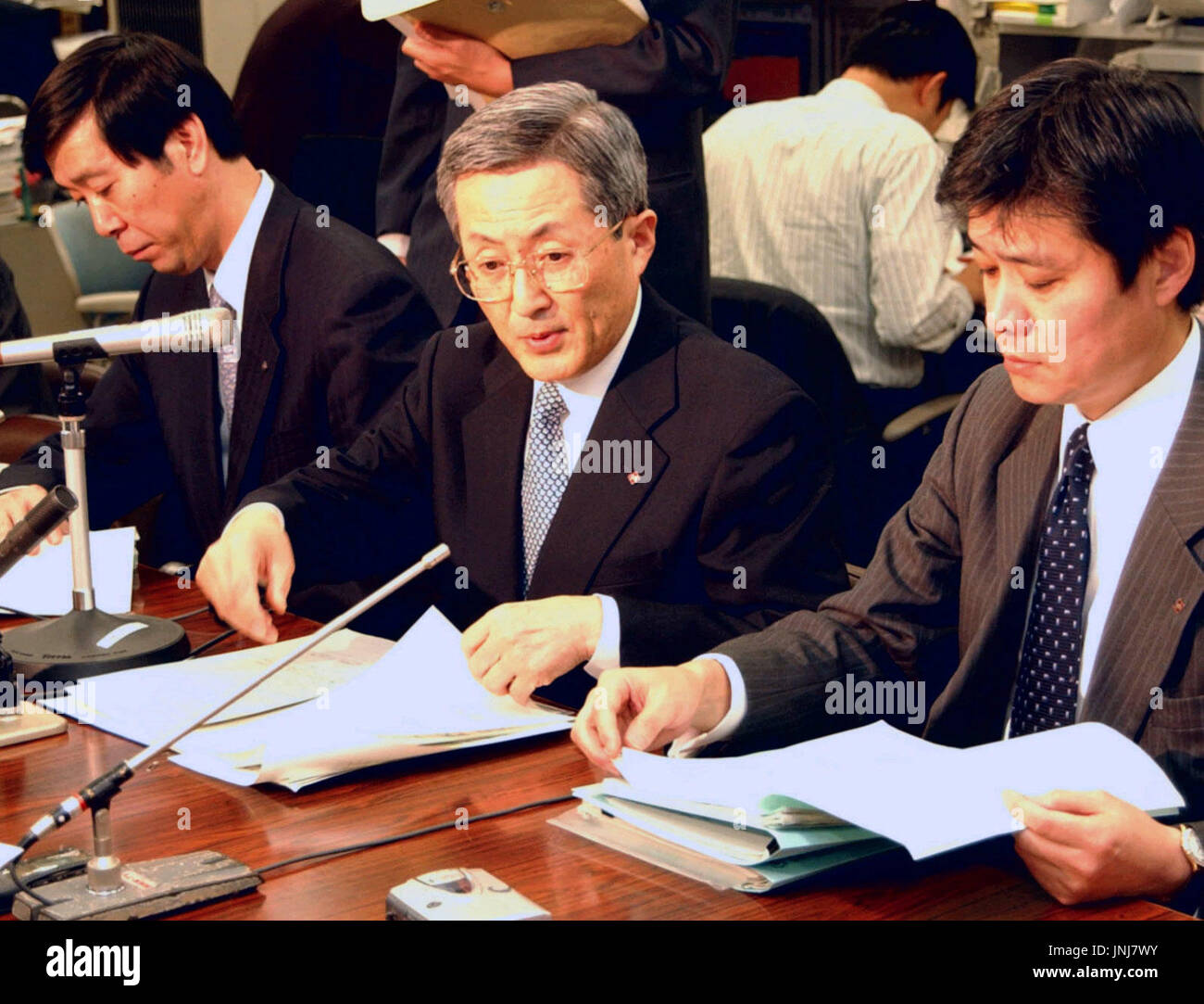 TOKYO, Japan - Mitsuhiro Ishibashi (C), vice president of Nippon Life ...