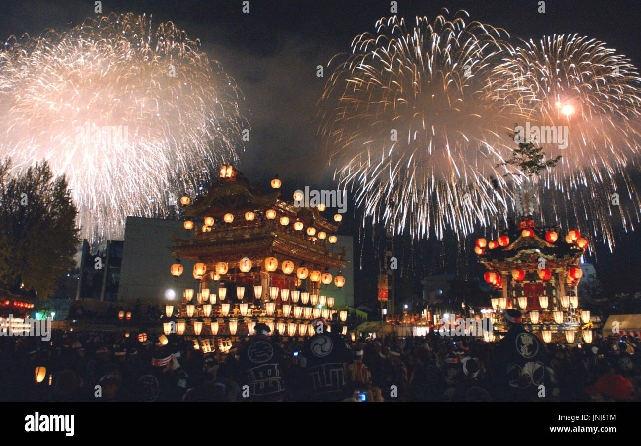CHICHIBU, Japan - Fireworks glitter above ''hoko'' floats, which ...