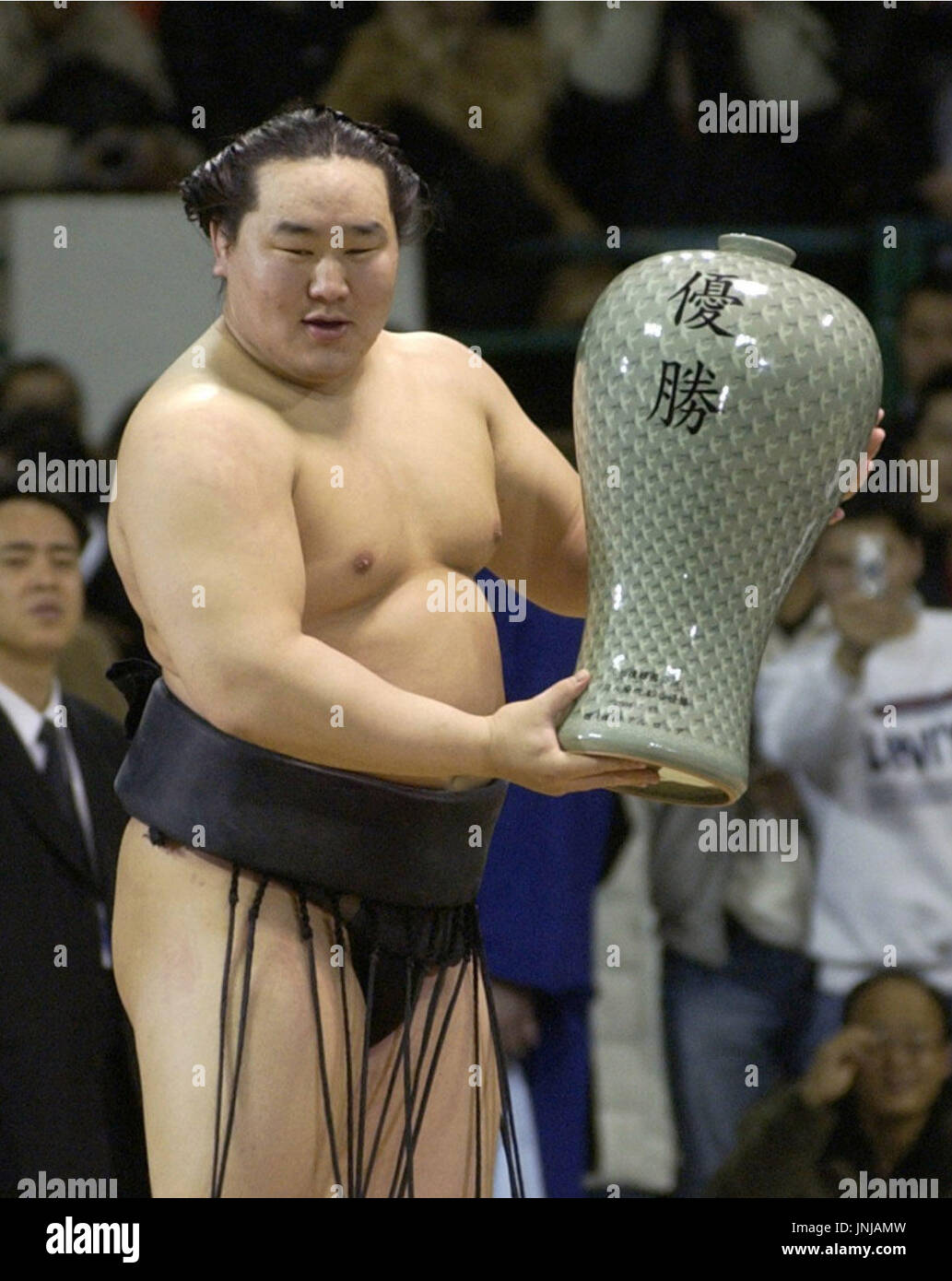 SEOUL, South Korea - Yokozuna Asashoryu holds up a victory cup Feb. 15 ...