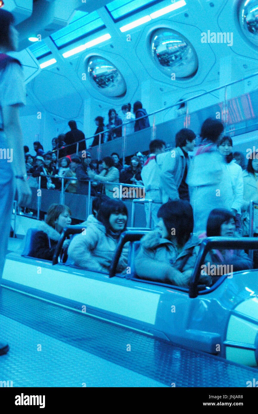 CHIBA, Japan - Visitors ride the ''Space Mountain'' roller coaster at ...