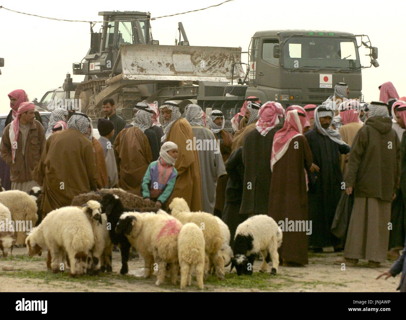 SAMAWAH, Iraq - Two armored vehicles carrying Japan's Ground Self ...