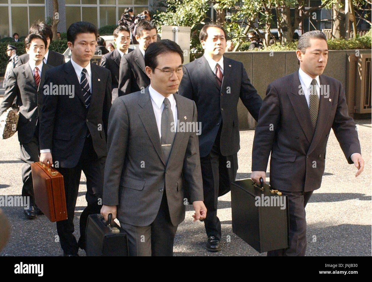 TOKYO, Japan - Prosecutors walk into the Tokyo District Court on Feb ...