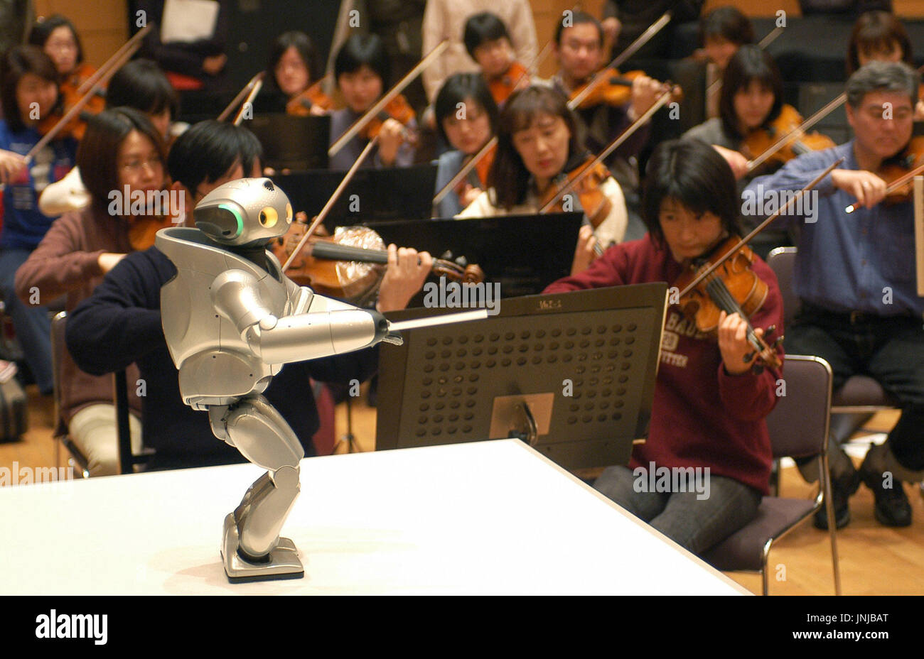 TOKYO, Japan - QRIO, a humanoid robot developed by Sony Corp., conducts ...