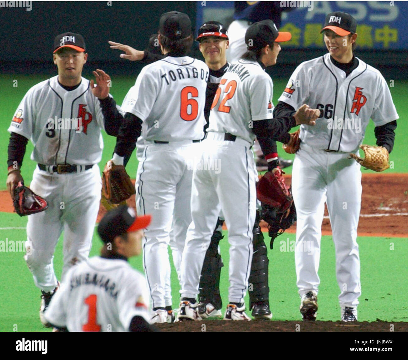 FUKUOKA, Japan - Members of the defending Pacific League baseball champion Daiei Hawks celebrate ...