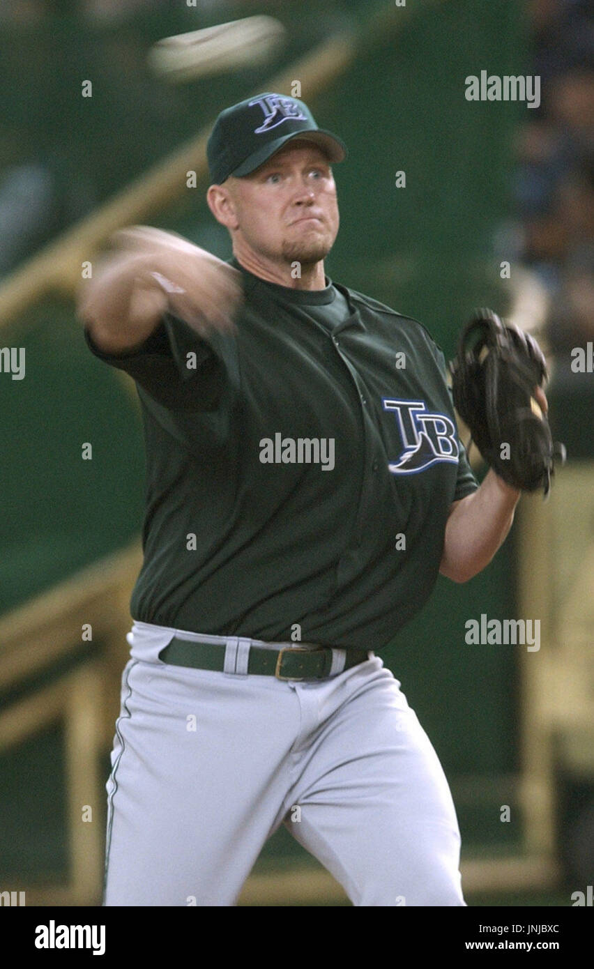 TOKYO, Japan - Tampa Bay Devil Rays' Aubrey Huff practices fielding at ...