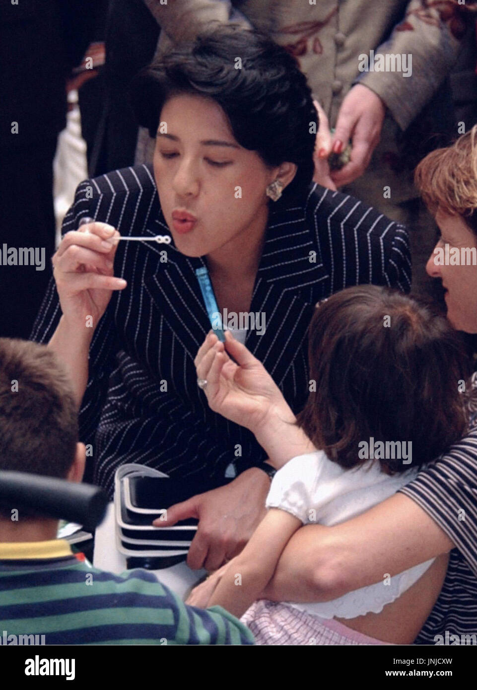 AUCKLAND, New Zealand - Crown Princess Masako makes a bubble for a ...