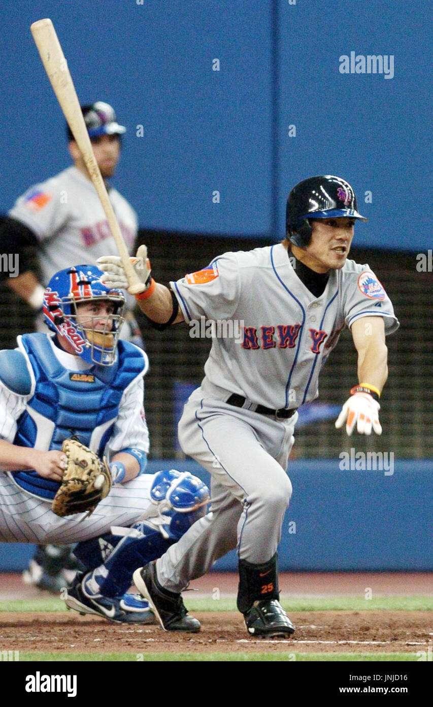 MONTREAL, Canada - New York Mets shortstop Kazuo Matsui hits a single ...