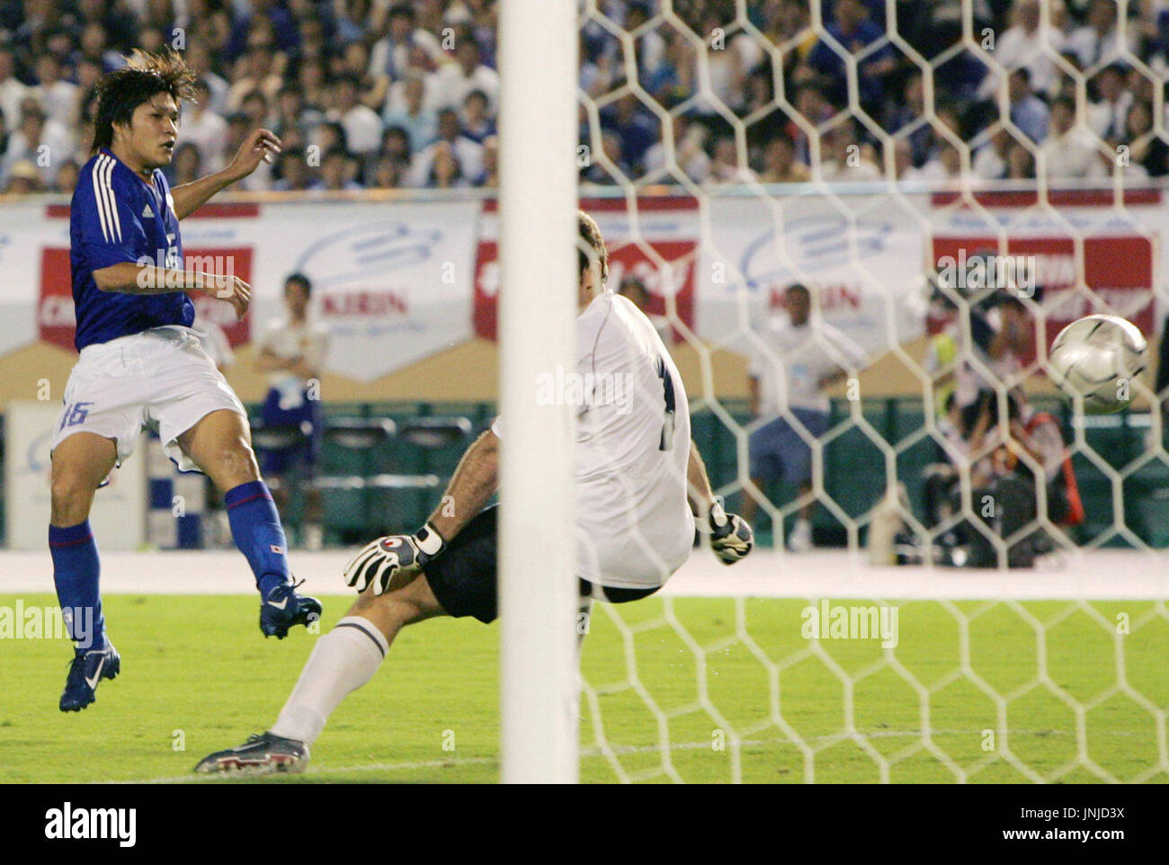 TOKYO, Japan - Japan Under-23 striker Yoshito Okubo scores an opener ...