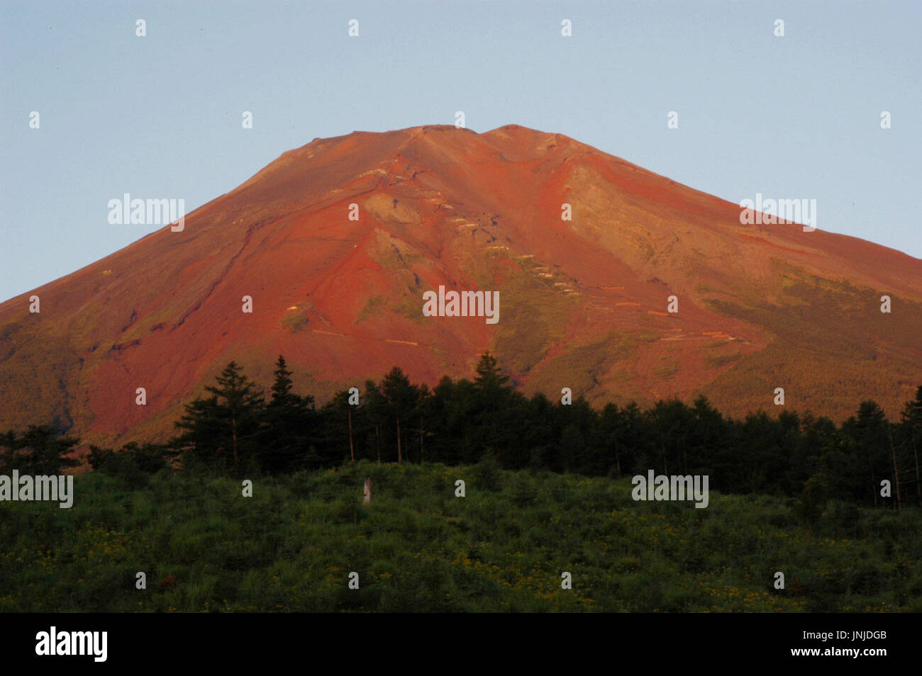 FUJIYOSHIDA, Japan - Mt. Fuji, the highest peak in Japan, turns reddish ...