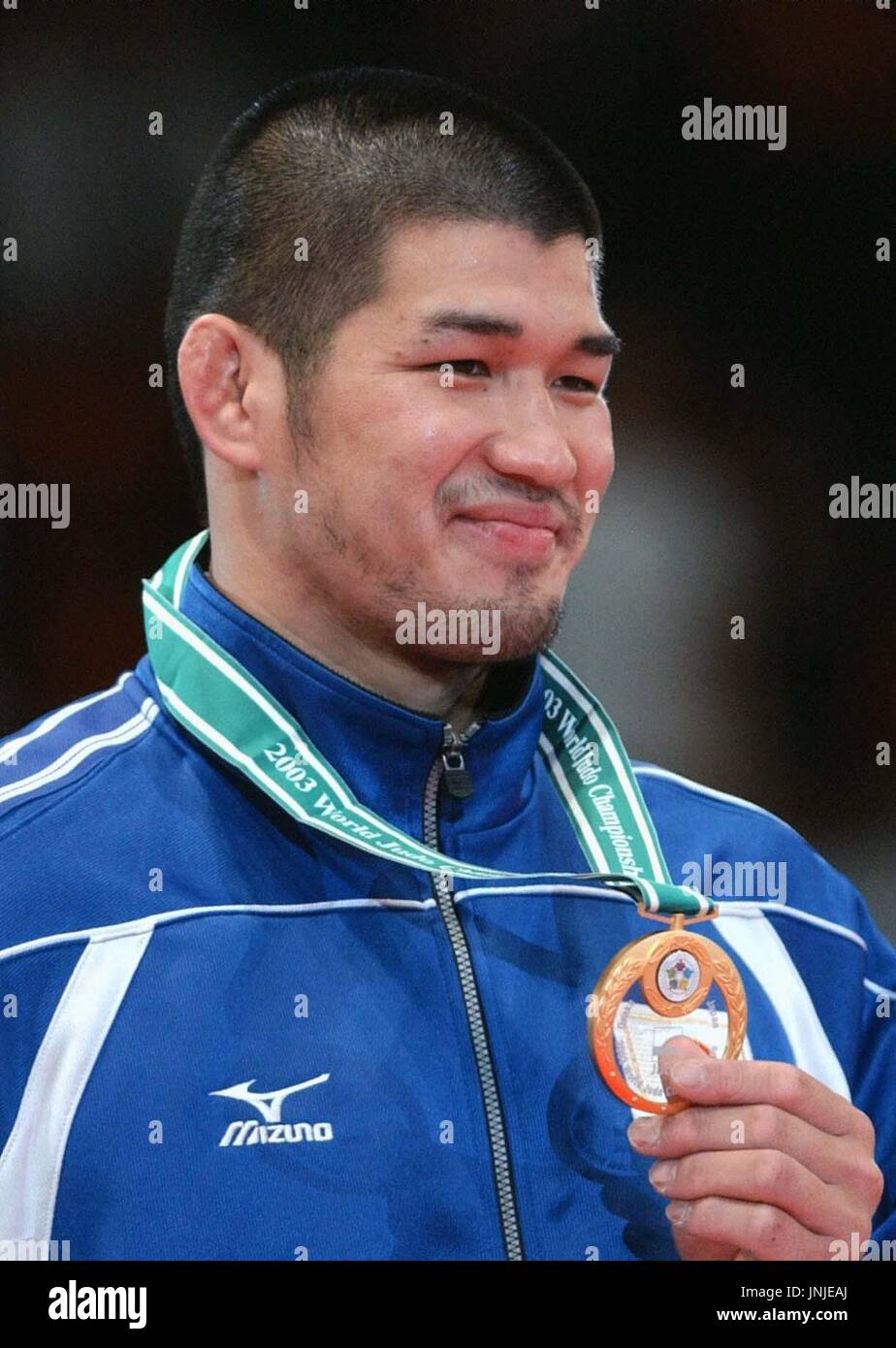 OSAKA, Japan - Kosei Inoue of Japan shows off his medal after winning ...