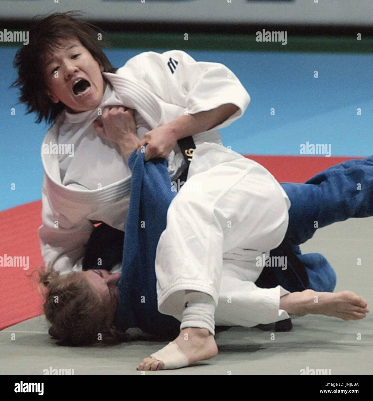 TOKYO, Japan - Ryoko Tani advances to semifinal of women's 48-kg ...