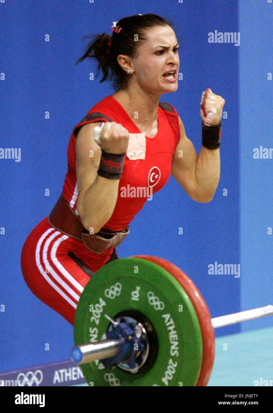 ATHENS, Greece - Nurcan Taylan reacts after winning the women's under ...
