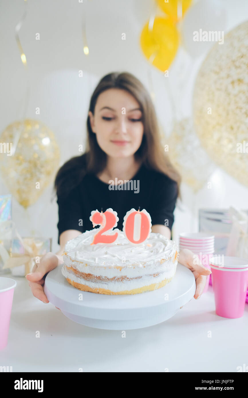 Young woman girl with cake isolated on white background Stock Photo - Alamy