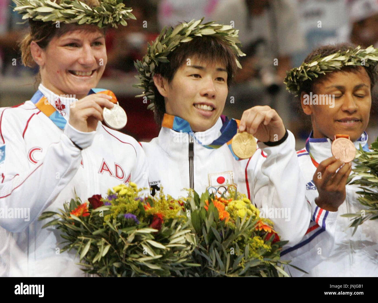 ATHENS, Greece - Silver medalist Tonya Verbeek of Canada (L), gold ...
