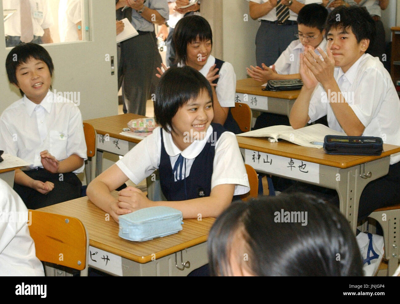 TOKYO, Japan - Mevisa Yoshida (C), a 13-year-old Thai girl living in ...