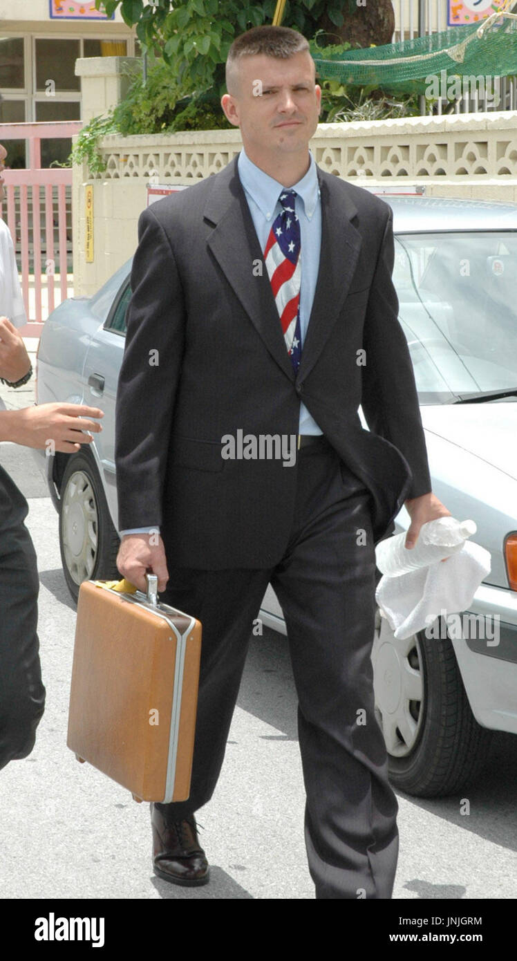 NAHA, Japan - U.S. Marine Maj. Michael Brown leaves the Naha District ...