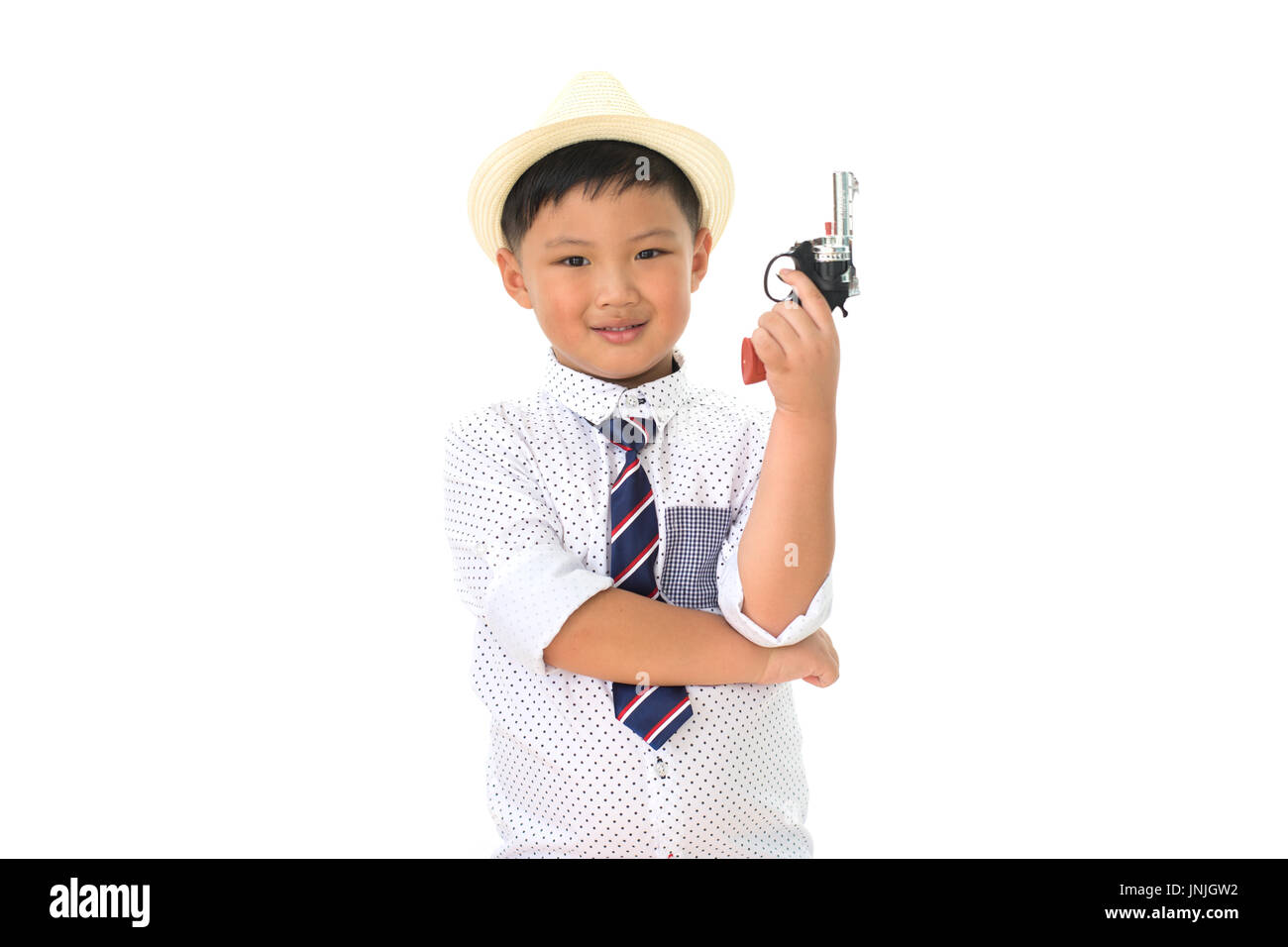 cute little boy playing with the gun toy isolated on white background ...