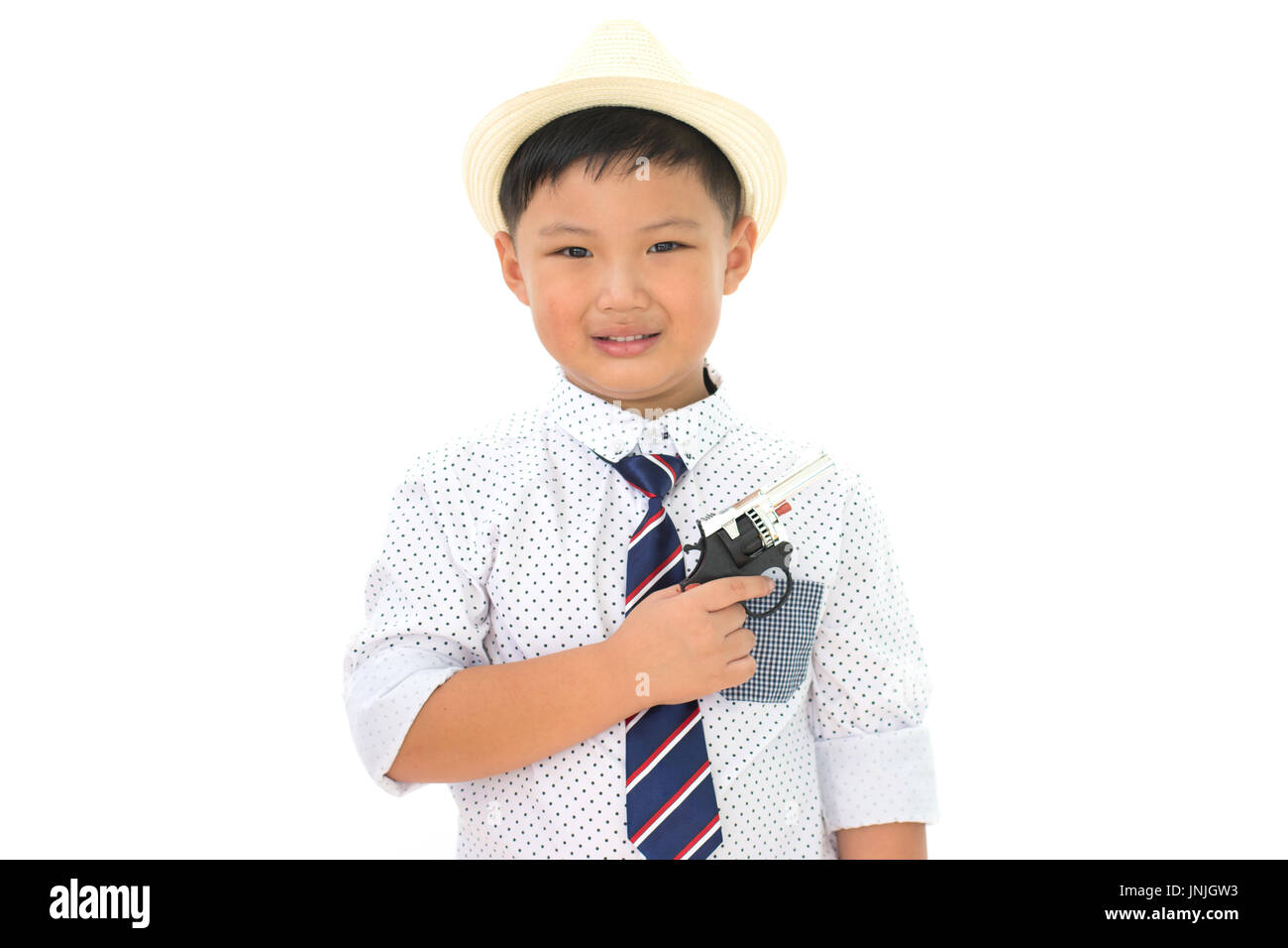 cute little boy playing with the gun toy isolated on white background ...