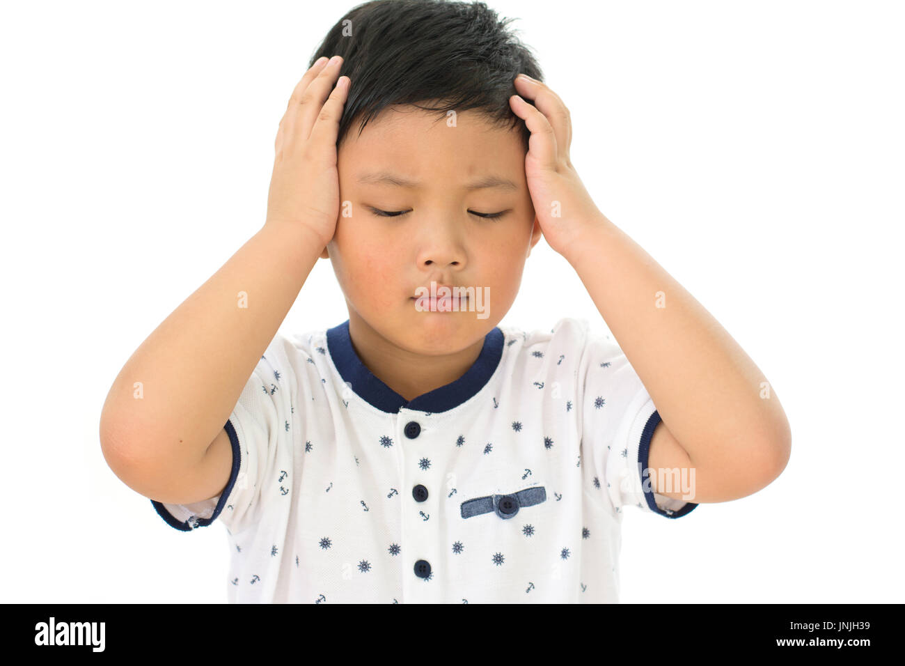 Little Thai boy has headache isolated on white background Stock Photo ...