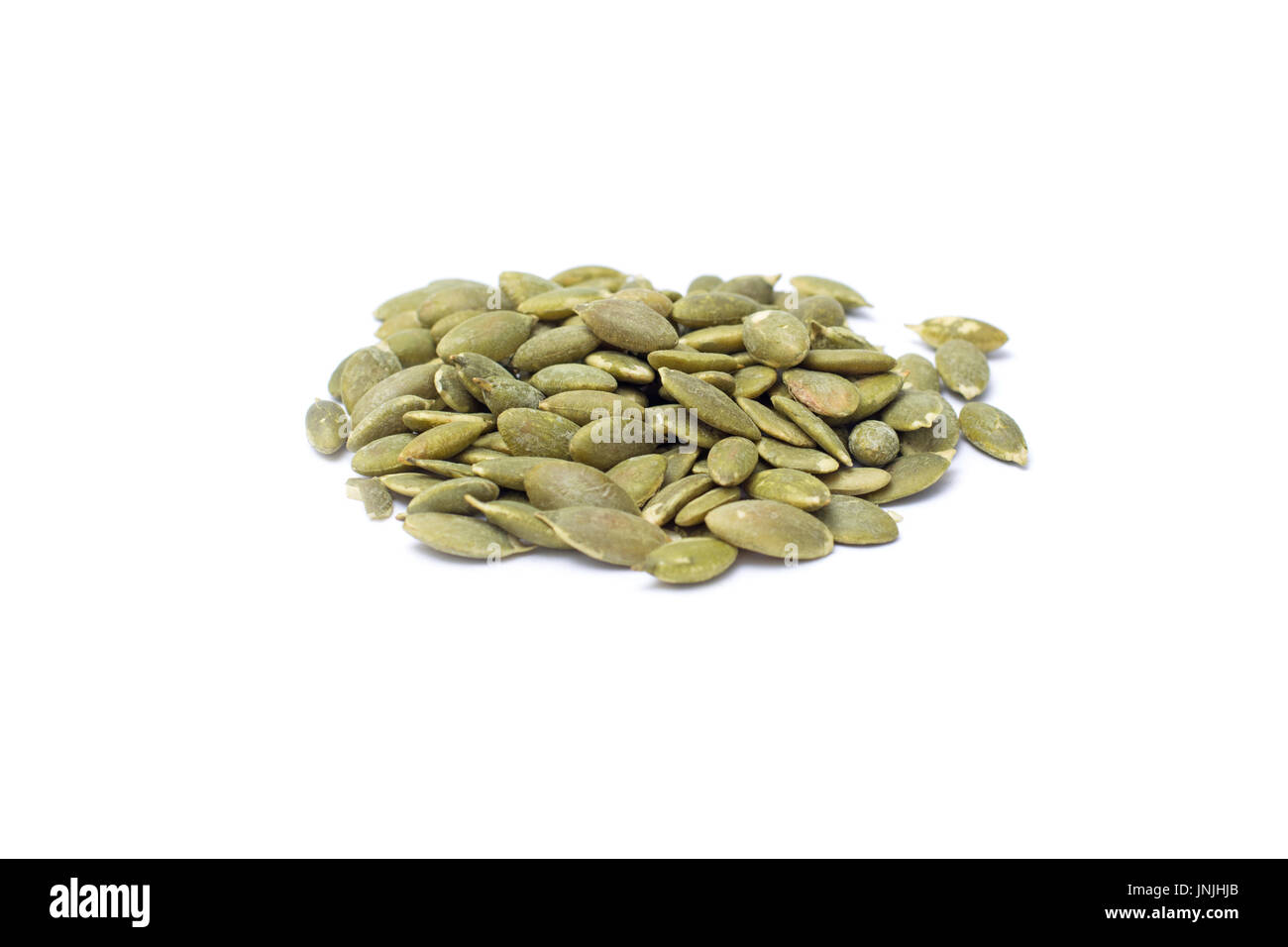 Roasted pumpkin kernels isolated on white background Stock Photo - Alamy
