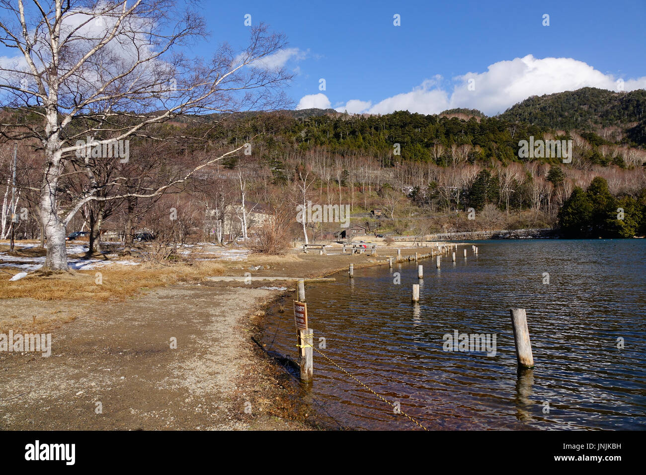 Lake scenery at winter with mountain background in Nikko, Japan Stock ...